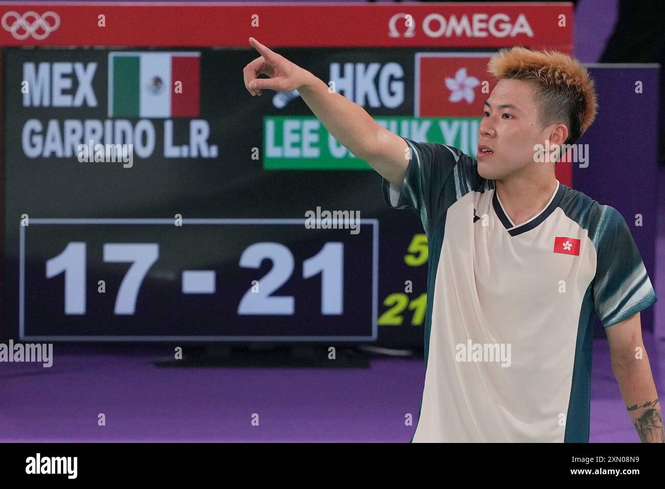 Hong Kong's Lee Cheuk Yiu celebrates after defeating Mexico's Luis ...