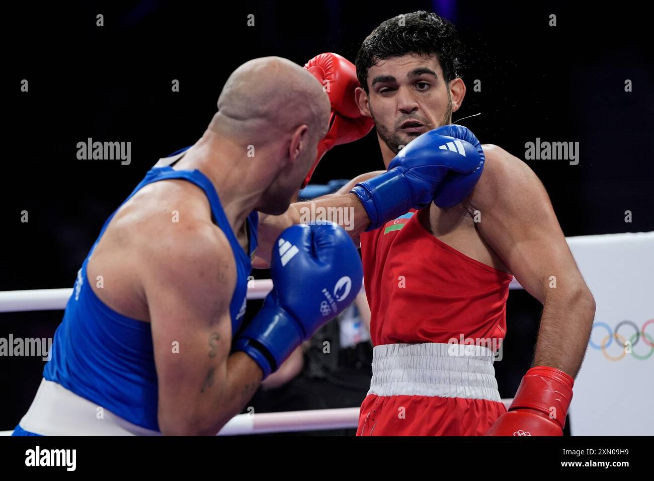 Azerbaijan's Murad Allahverdiyev, right, fights Egypt's Abdelrahman ...
