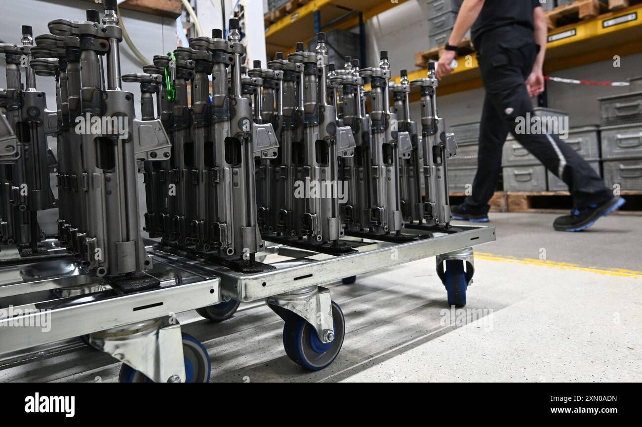 10 July 2024, Baden-Württemberg, Oberndorf: Weapon parts stand in a ...