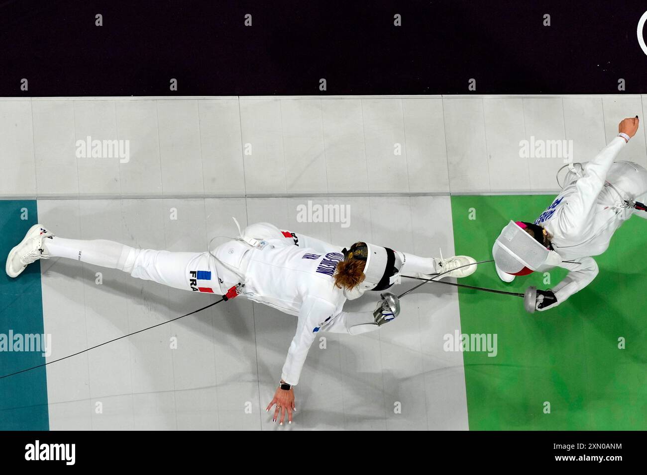 Poland's Aleksandra Jarecka, right, competes with France's Auriane ...