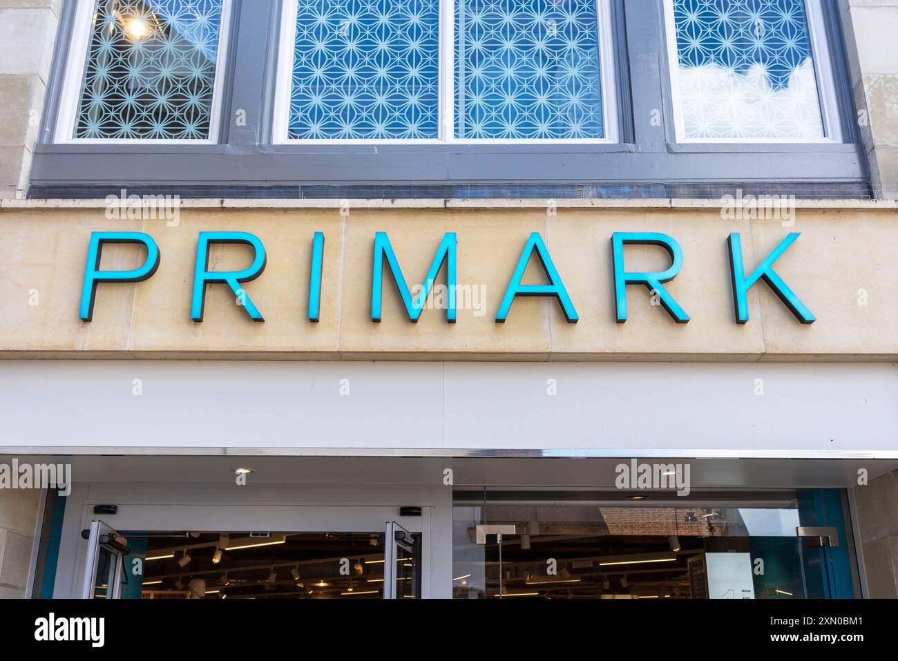 Primark clothing store sign above entrance Stock Photo - Alamy
