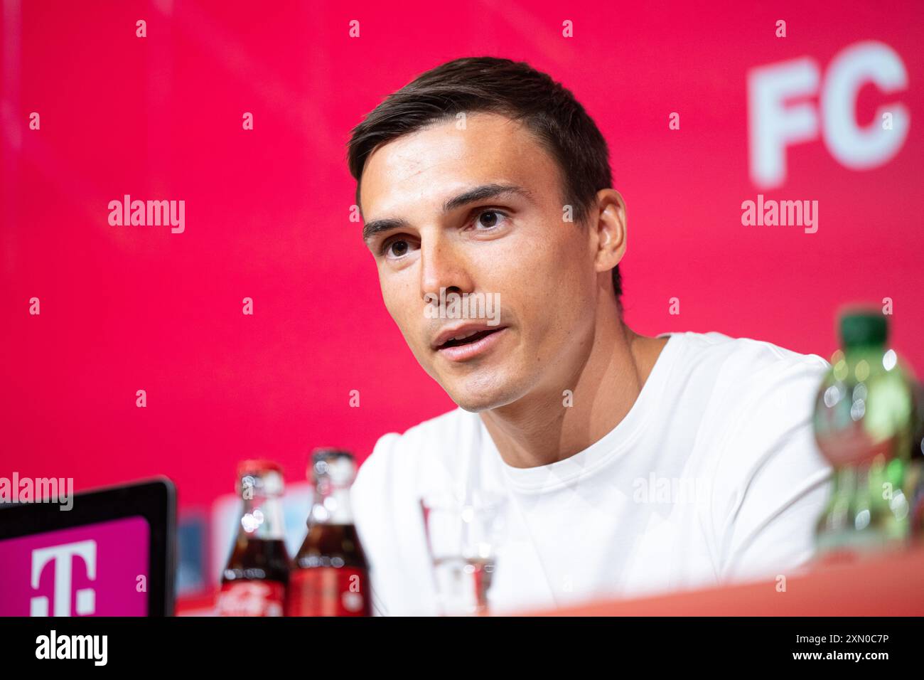 Munich, Germany. 30th July, 2024. Joao Palhinha speaks during his presentation as a new signing ...