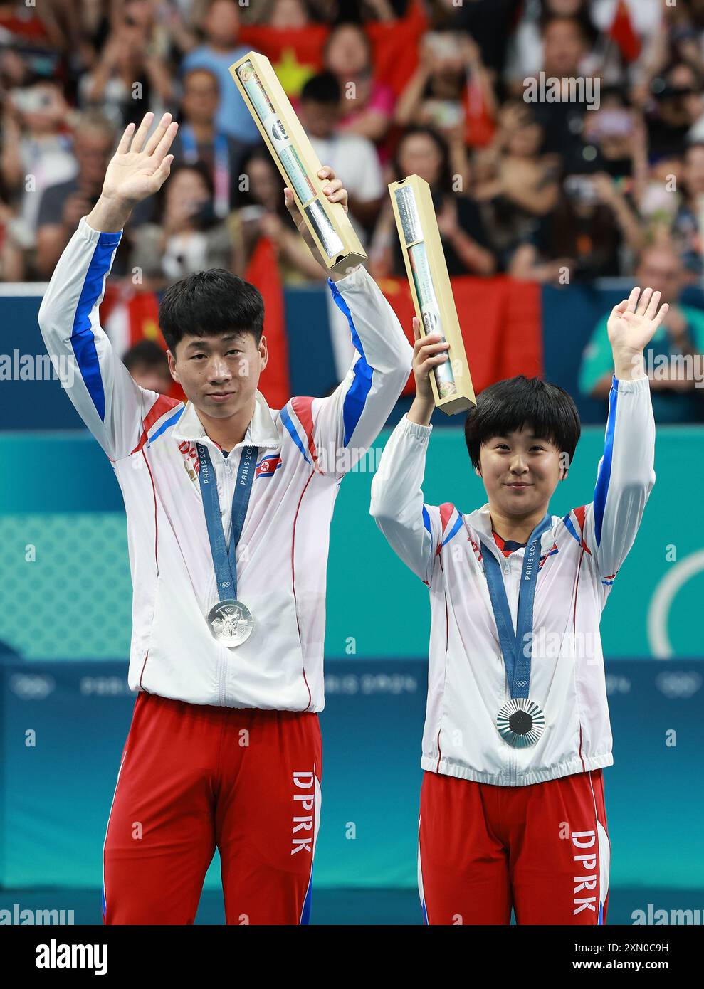 Paris, France. 30th July, 2024. Silver medalists Ri Jong Sik (L)/Kim ...