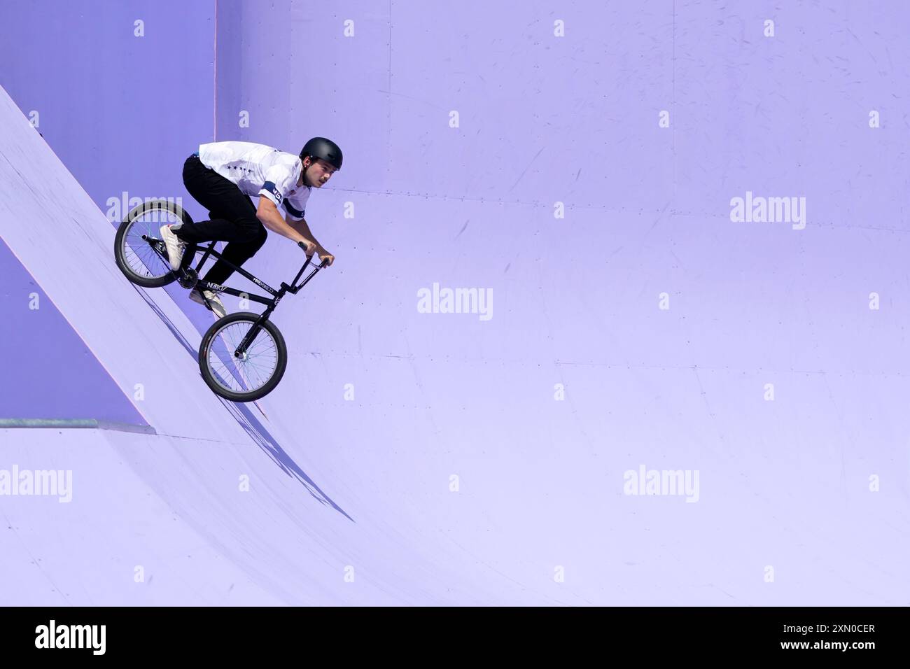 Justin Dowell, of the United States, competes in the cycling BMX ...
