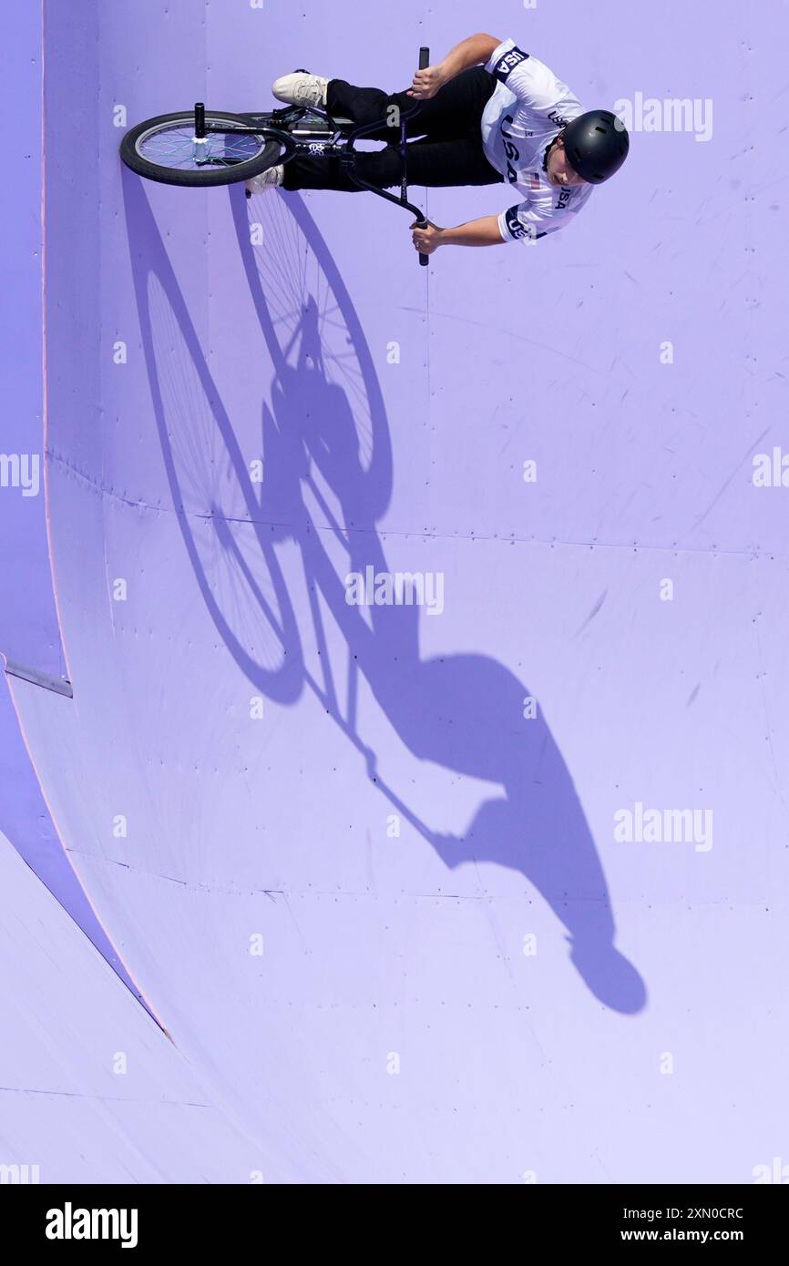 Justin Dowell, of the United States, competes in the cycling BMX ...