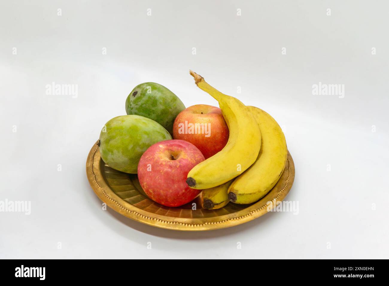 Puja Thali with Apple Banana Mango Fruits and Indian Sweets Rasbhari ...