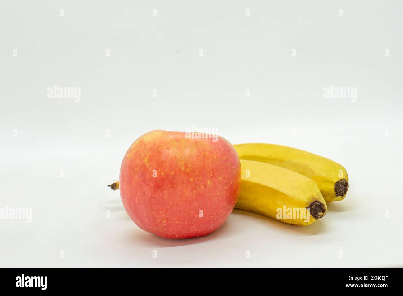Apple and Banana Isolated in White Background png Stock Photo - Alamy