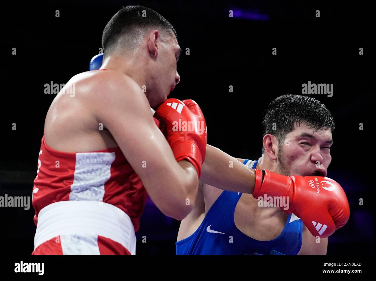 Australia's Callum Peters, left, fights Kazakhstan's Nurbek Oralbay in ...
