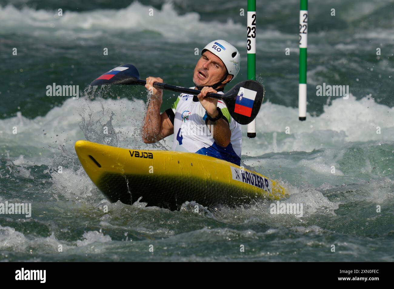 Peter Kauzer of Slovenia competes in the men's kayak single heats at ...
