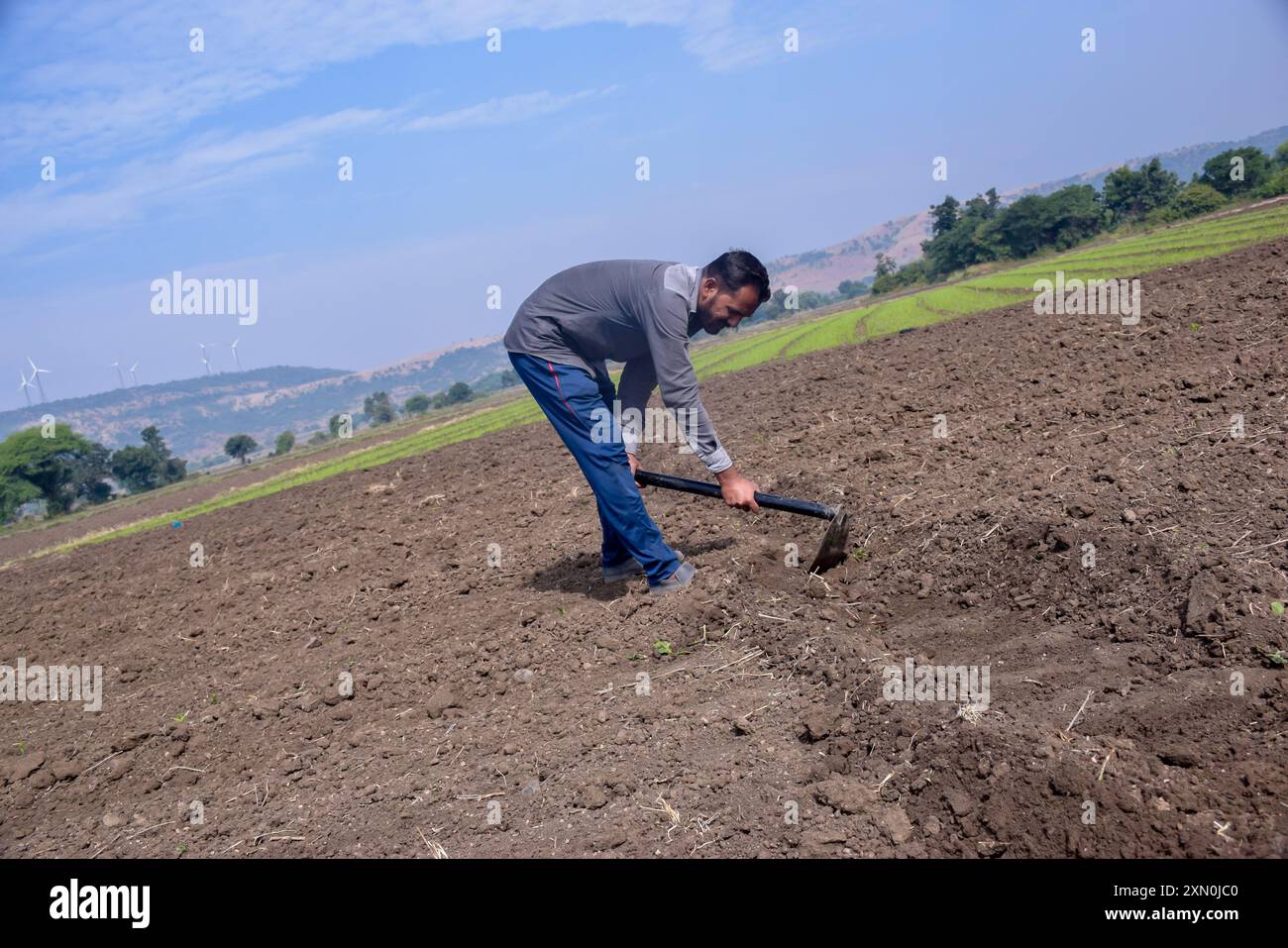 Indian farmer digging hi-res stock photography and images - Alamy