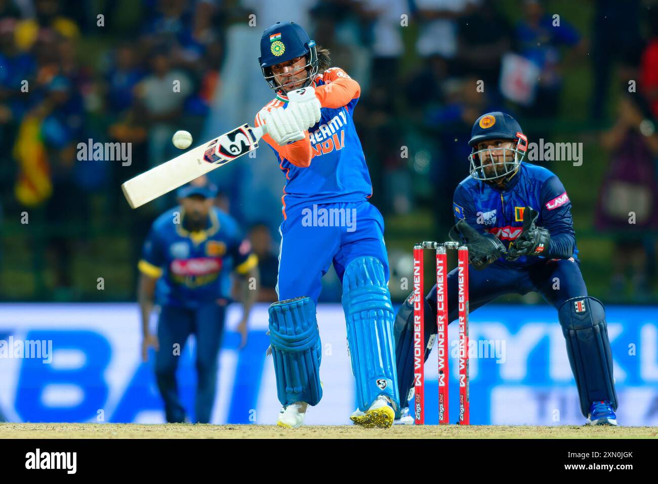 Kandy, Sri Lanka. 30th July 2024. India's Ravi Bishnoi (C) plays a shot ...