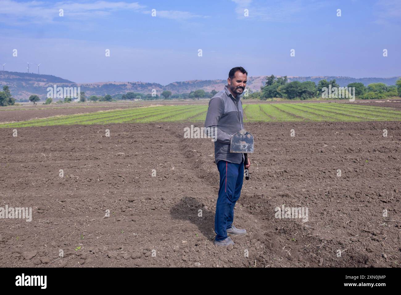 Indian farmer digging hi-res stock photography and images - Alamy