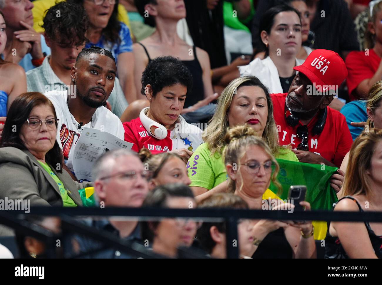 Jonathan Owens sits with Nellie and Ronald Biles, husband and parents ...