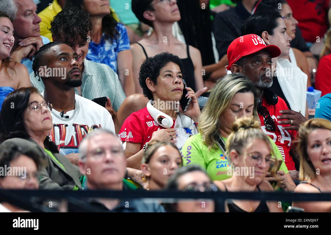 Jonathan Owens sits with Nellie and Ronald Biles, husband and parents ...