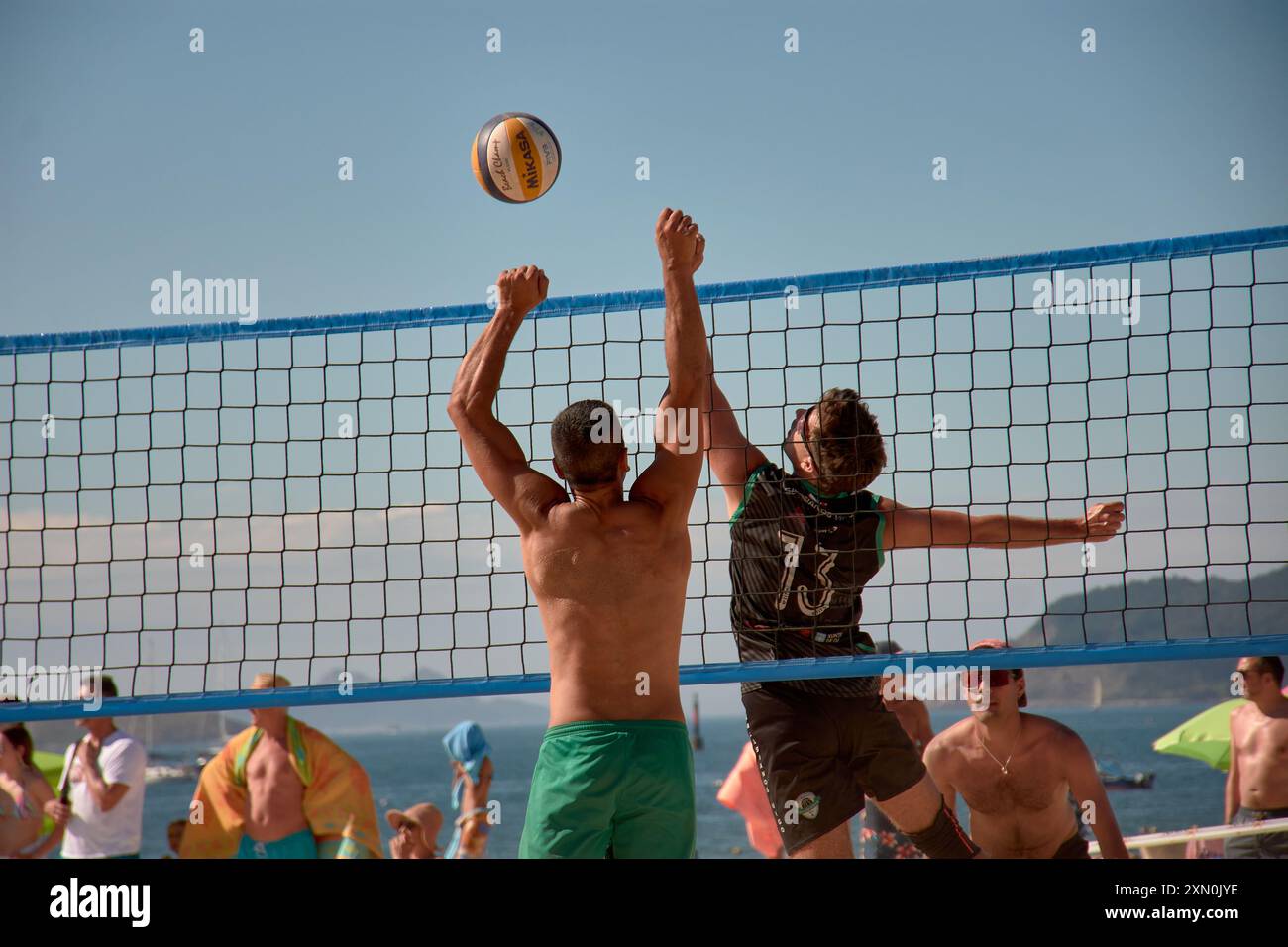 In an intense moment during the 3x3 Ladeira Beach Volleyball Tournament ...