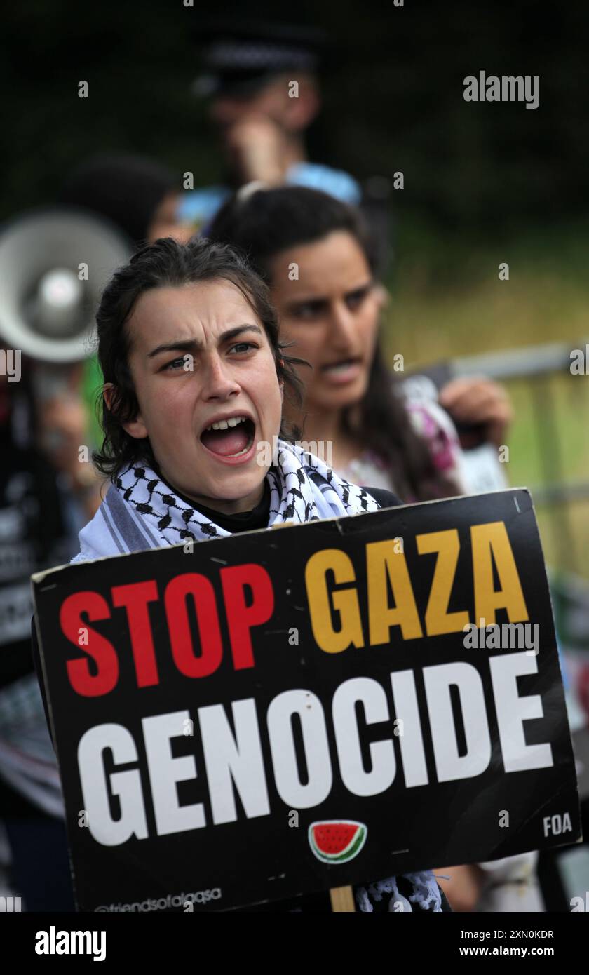 Shenstone, England, UK. 30th July, 2024. A protester holds a sign ...