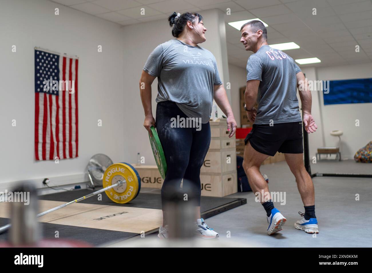 Weightlifter Mary Theisen-Lappen, left, works out with her coach, Will ...