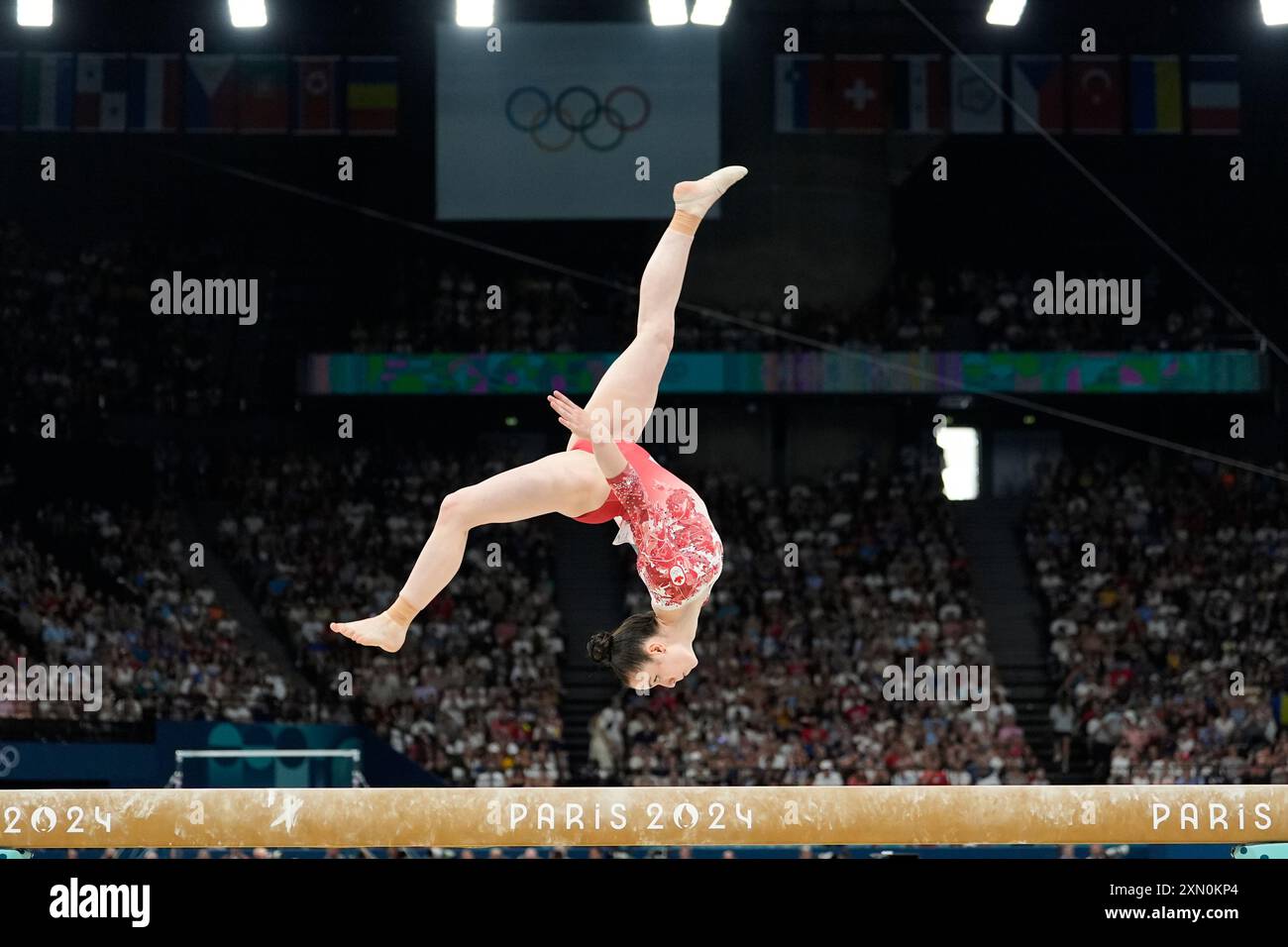 Ava Stewart, of Canada, performs on the balance beam during the women's ...