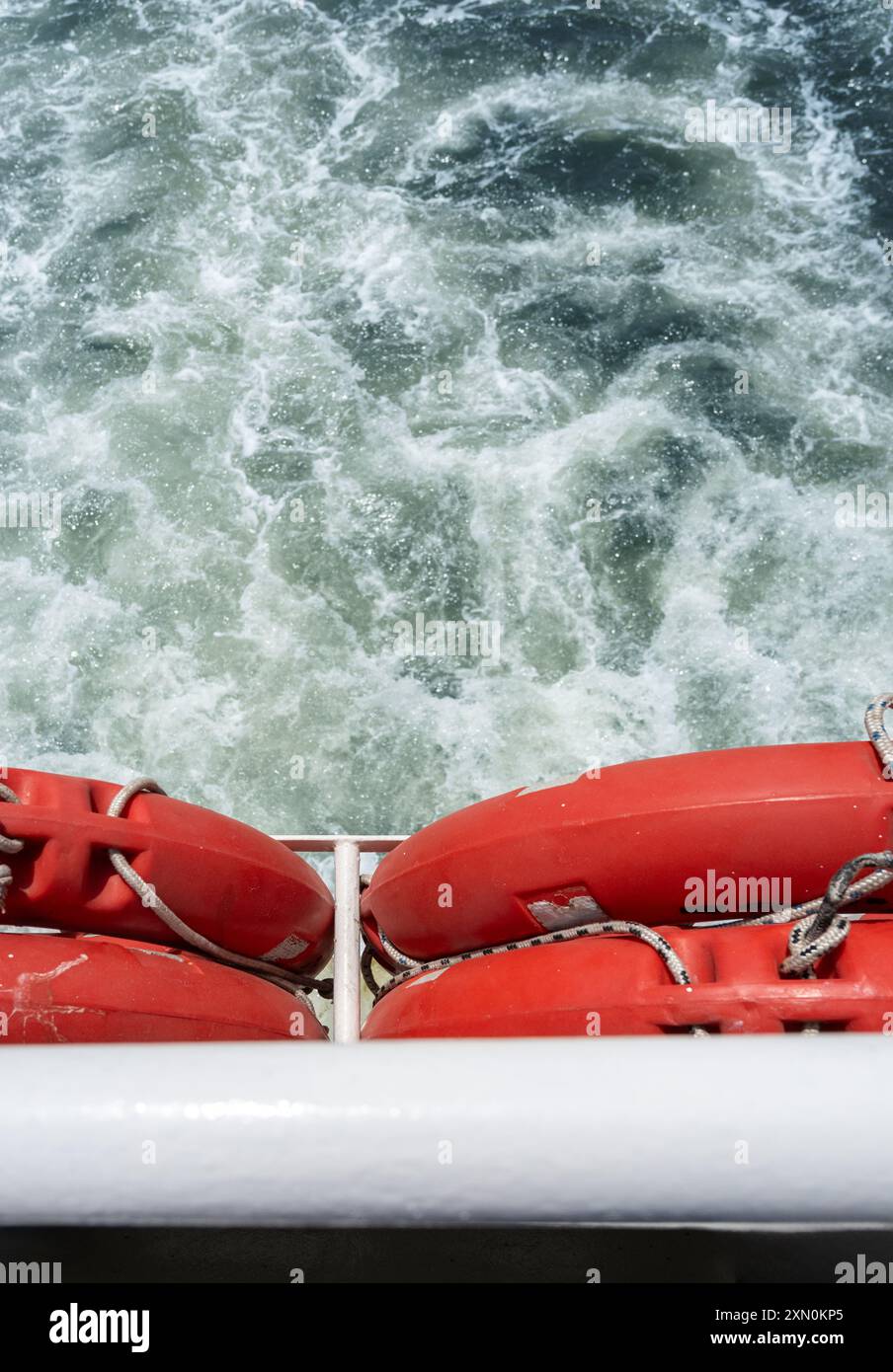 Splashing sea waves behind passenger hi-res stock photography and ...