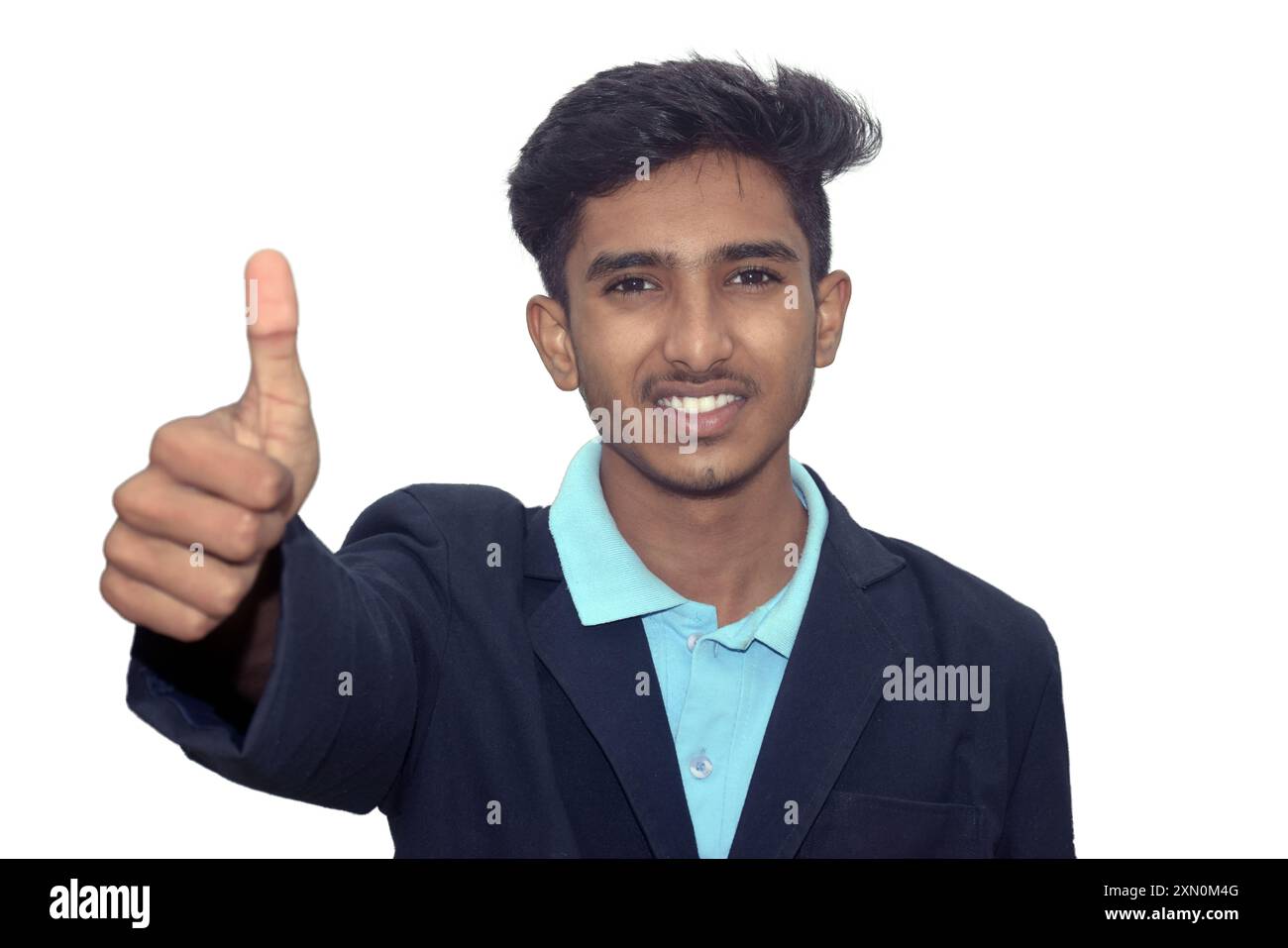smart teenage school boy gives thumbs up pose, isolated white ...