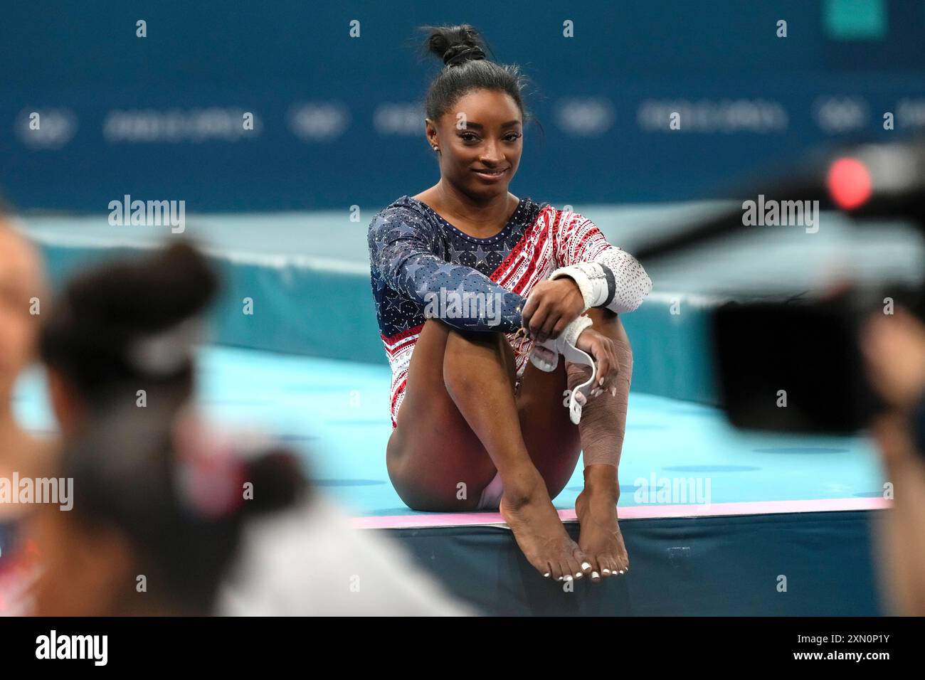 Simone Biles, of the United States, smiles during the women's artistic ...