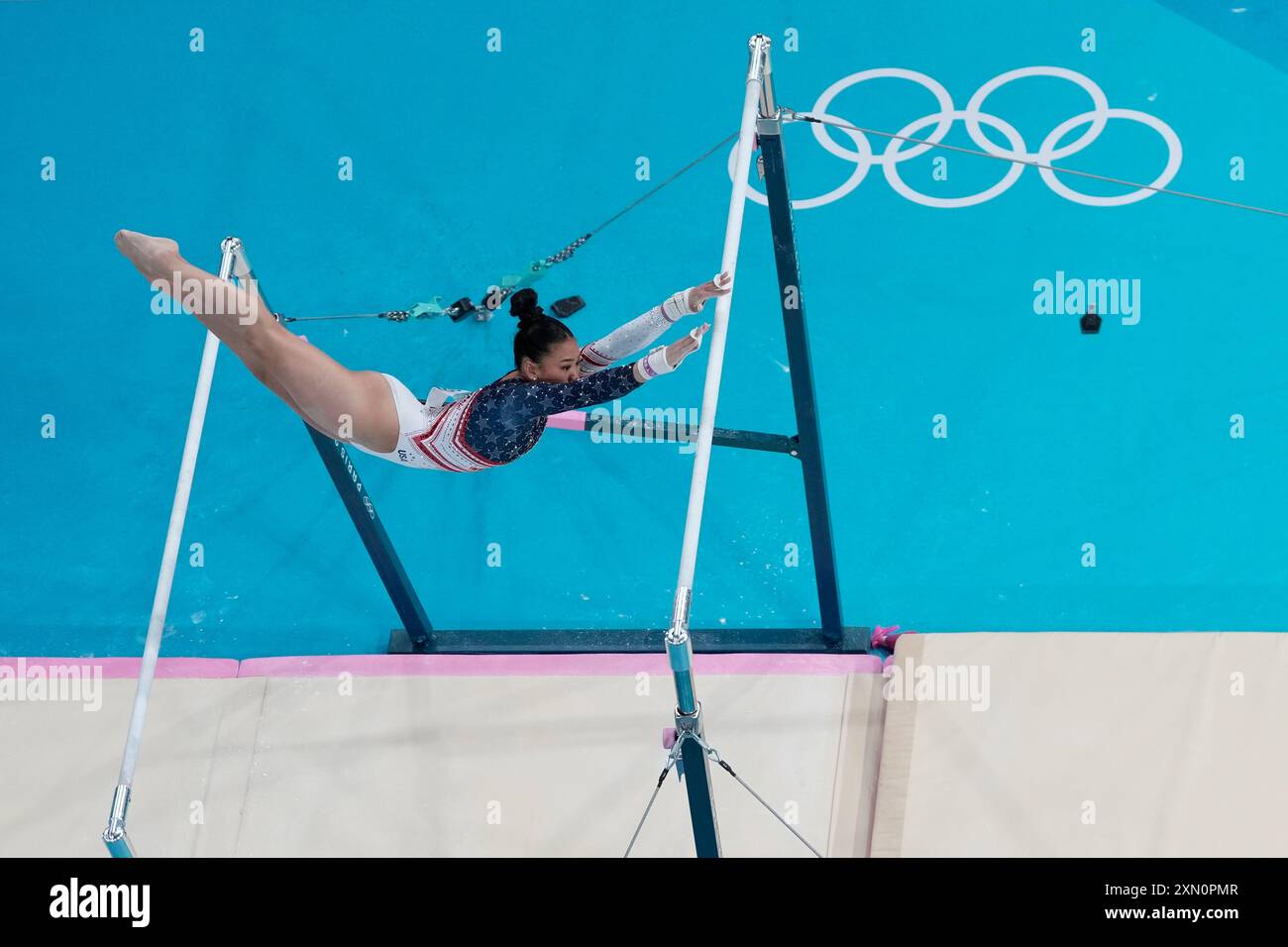 Sunisa Lee, of United States, performs on the uneven bars during the ...