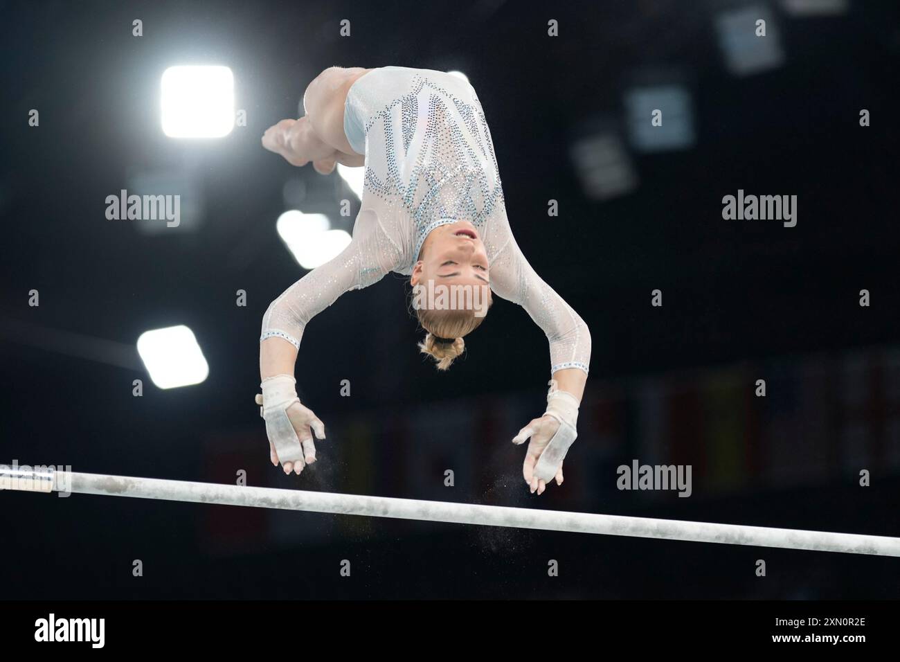 Alice D'Amato, of Italy, performs on the uneven bars during the women's ...