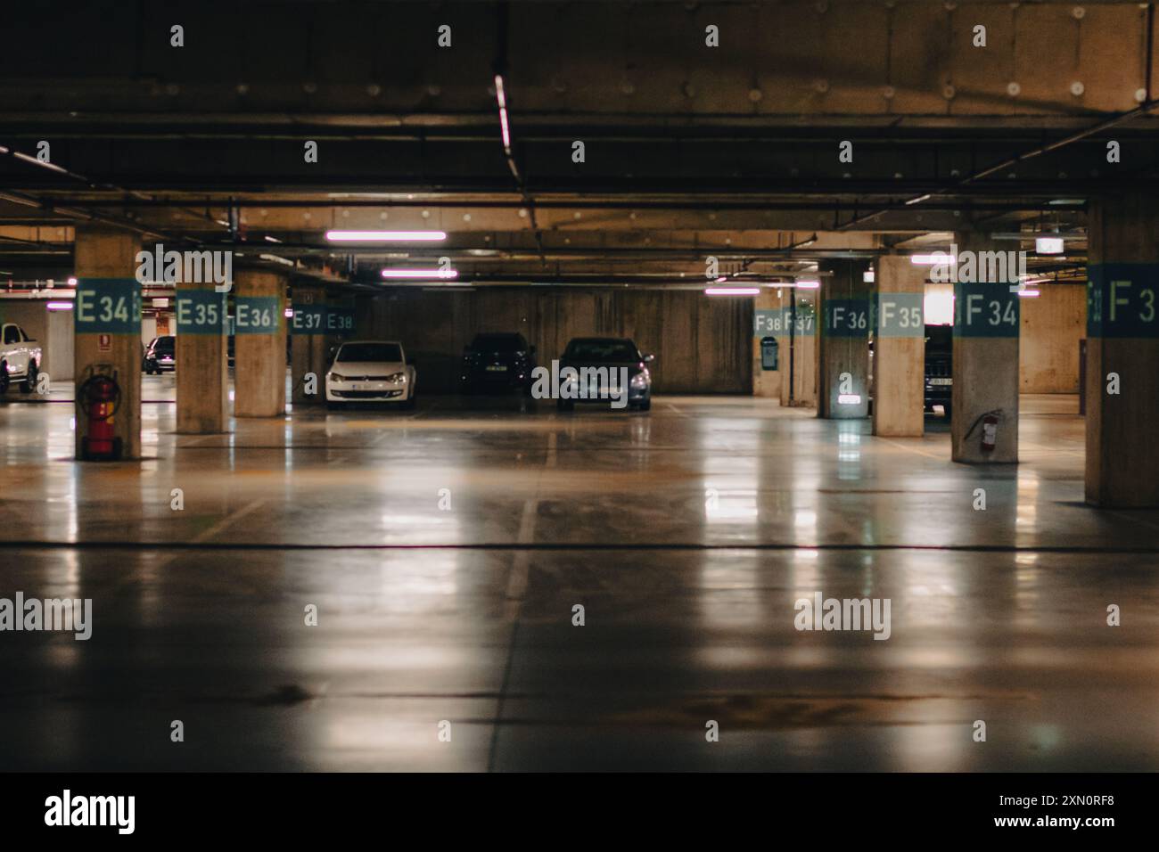 Empty parking lot with dim light. Underground parking garage Stock ...