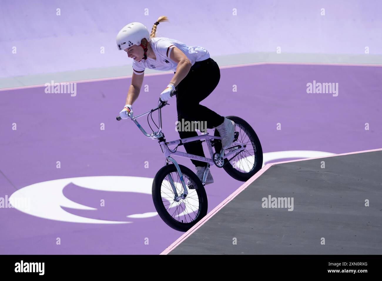 Kim Lea Mueller, of Germany, competes in the cycling BMX freestyle ...