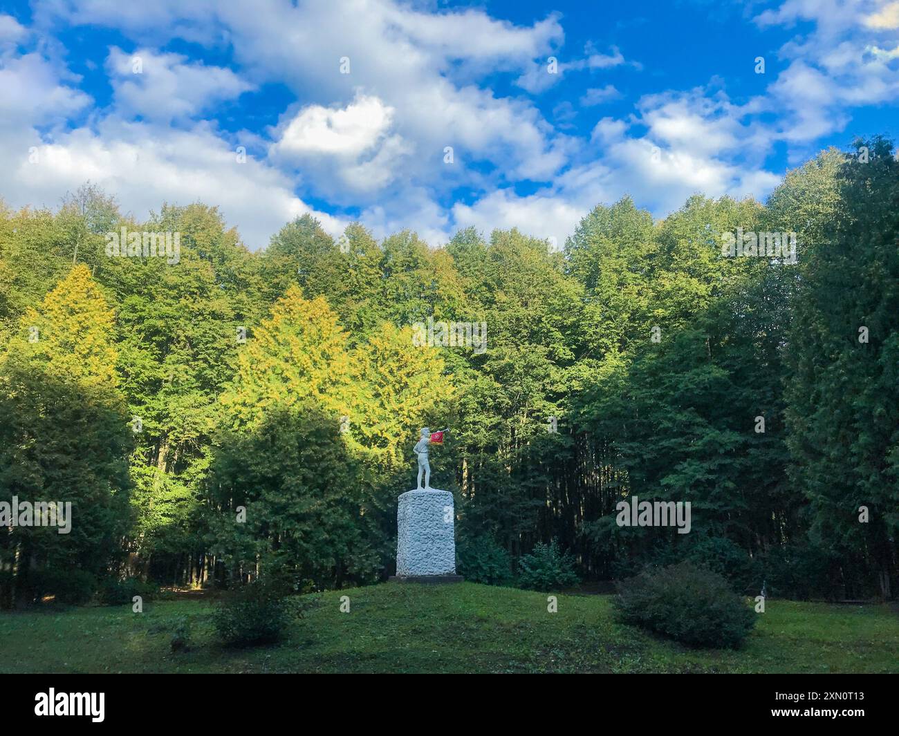Moscow region, Russia, August 2019: White statue of a boy pioneer ...