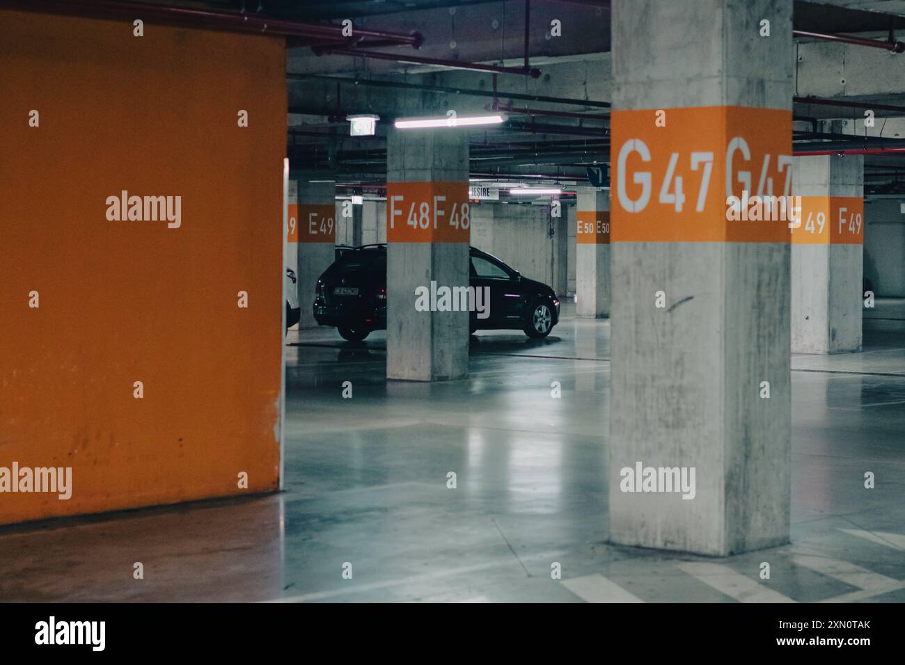 Empty parking lot with dim light. Underground parking garage Stock ...