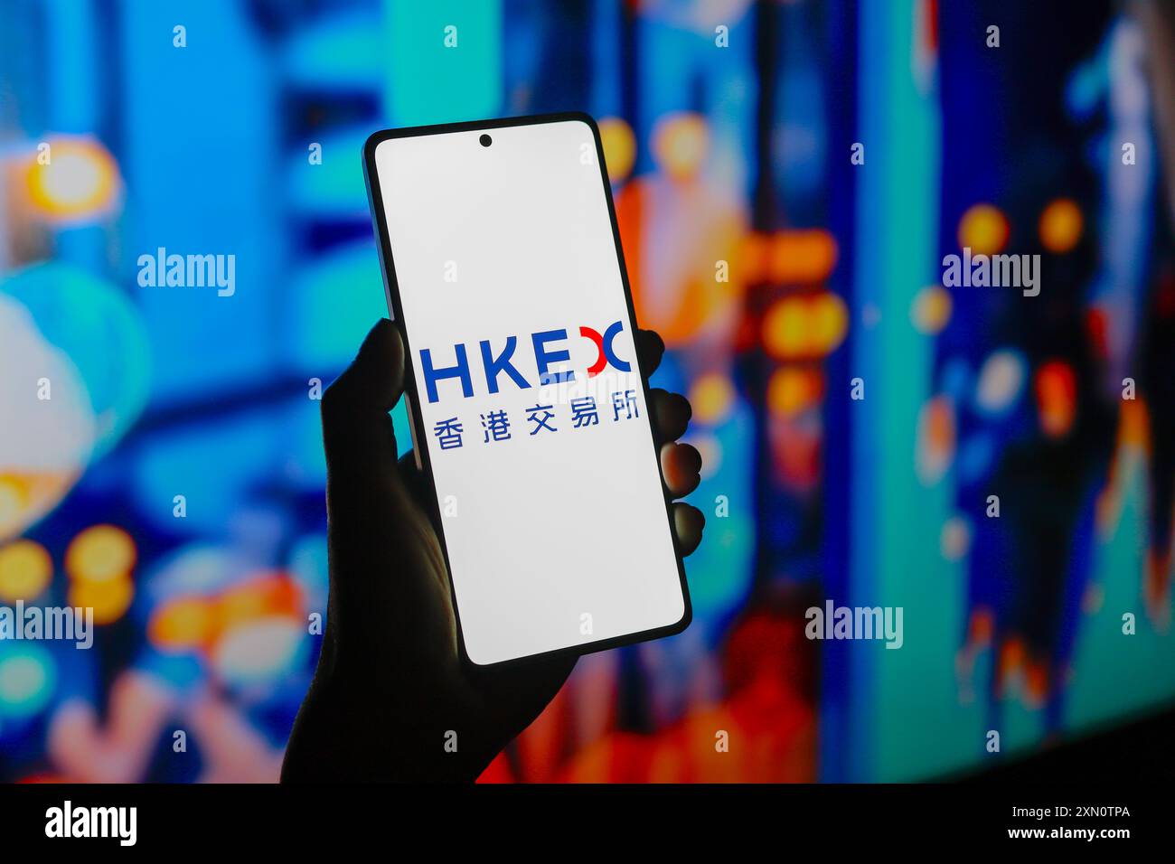 In this photo illustration, the Hong Kong Stock Exchange (HKEX) logo is ...