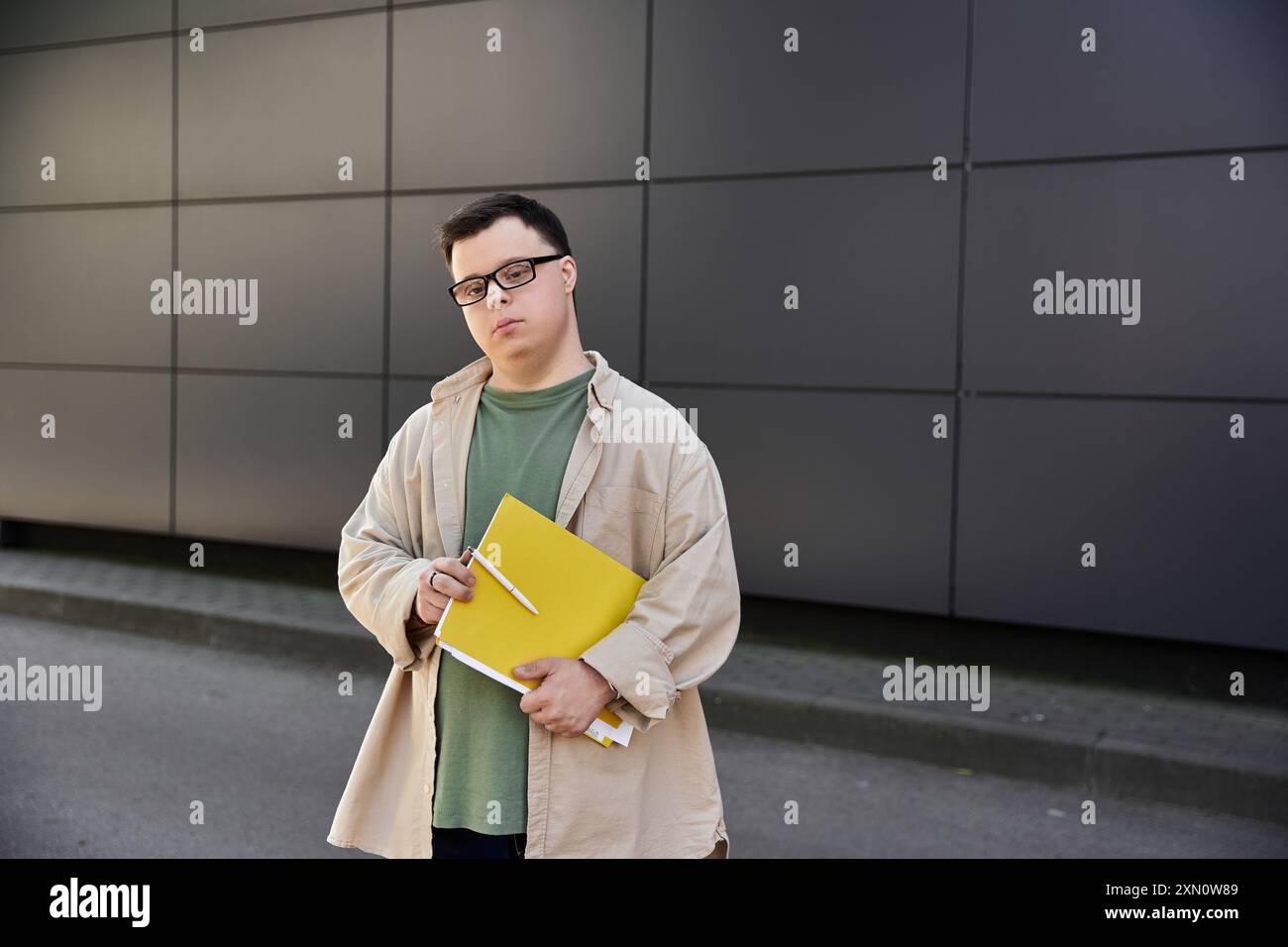 Man down syndrome holds hi-res stock photography and images - Alamy