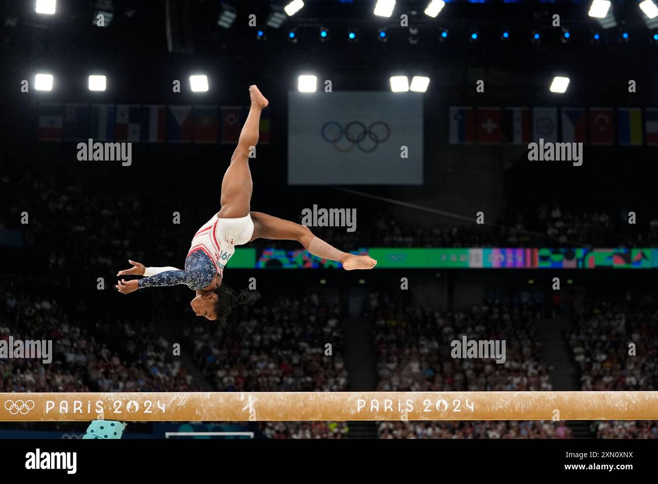 Simone Biles, of the United States, performs on the balance beam during ...
