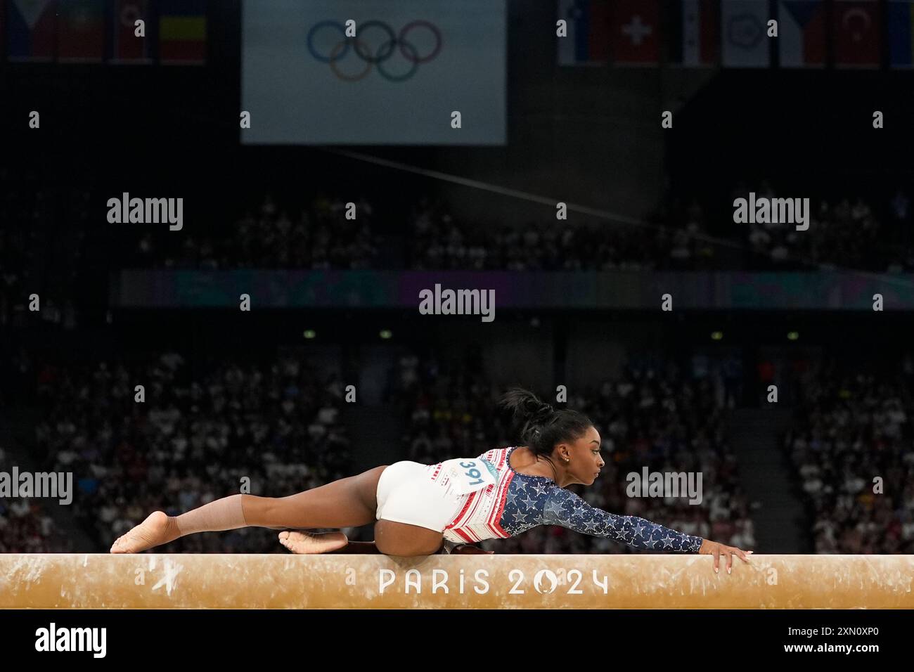 Simone Biles, of the United States, performs on the balance beam during ...