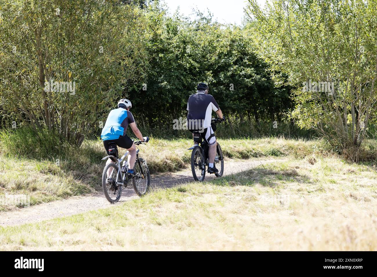 Two male cyclists riding hi-res stock photography and images - Alamy