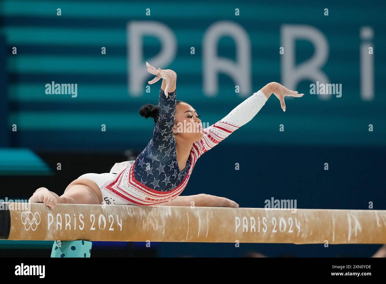 Suni Lee, of the United States, performs on the balance beam during the ...