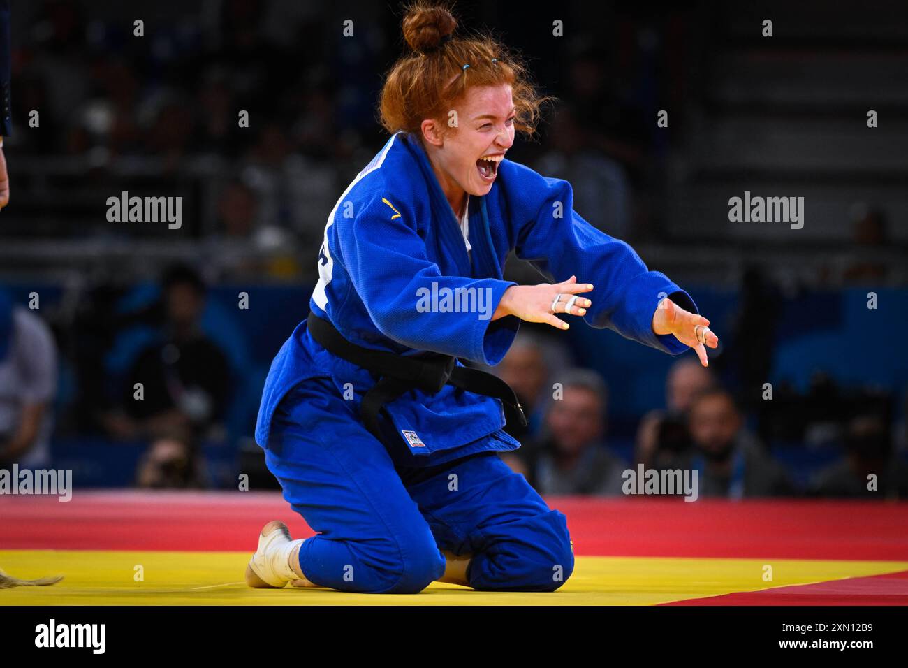 Lubjana Piovesana ( AUT ) celebrates her victory against Jisu Kim ( KOR ...