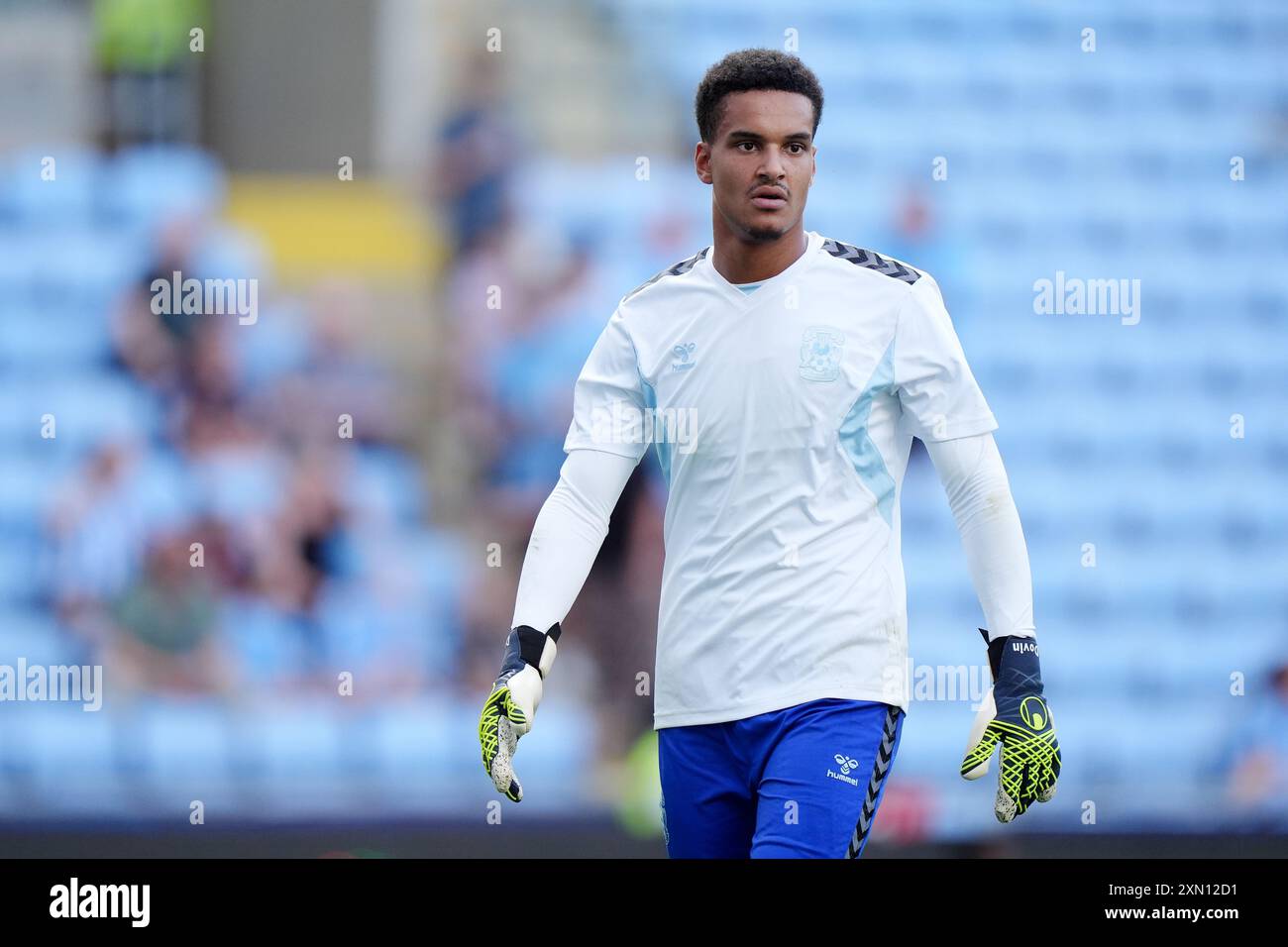 Coventry City goalkeeper Oliver Dovin warms up ahead of the pre-season ...
