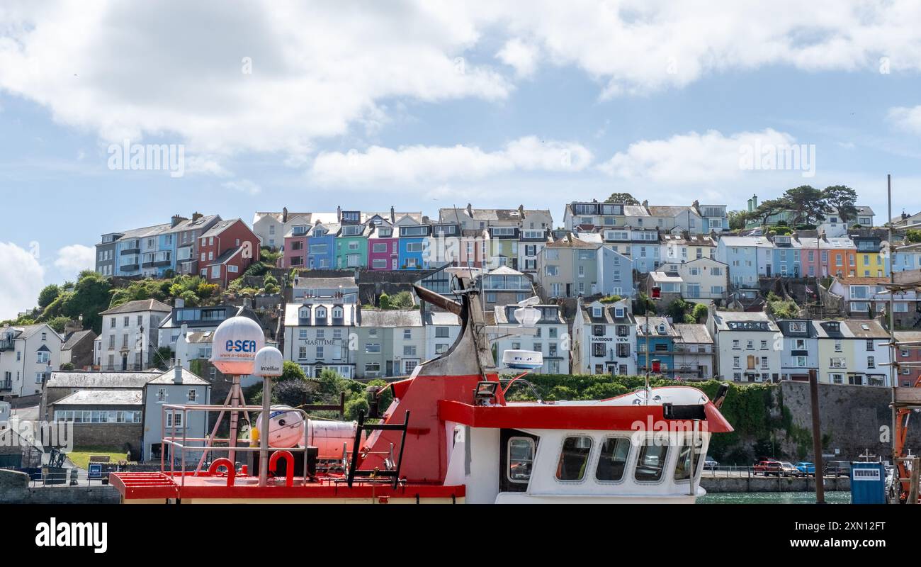 Colourful houses overlooking the harbour in the seaside town of Brixham ...