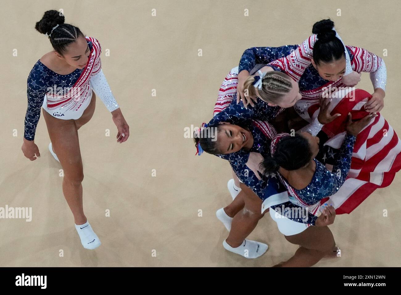 The United States women's gymnastics team celebratyes after winning the ...