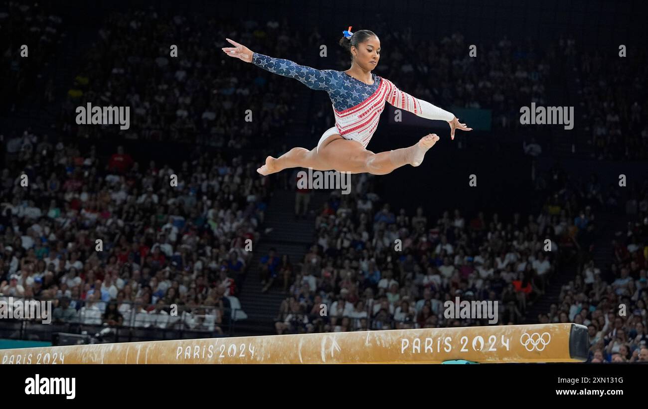 Jordan Chiles, of the United States, performs on the balance beam ...