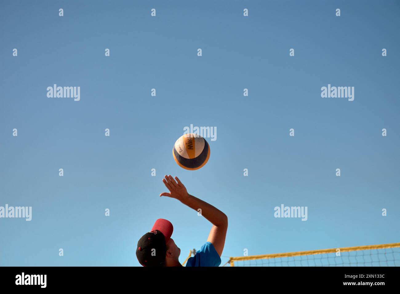 In an intense moment during the 3x3 Ladeira Beach Volleyball Tournament ...