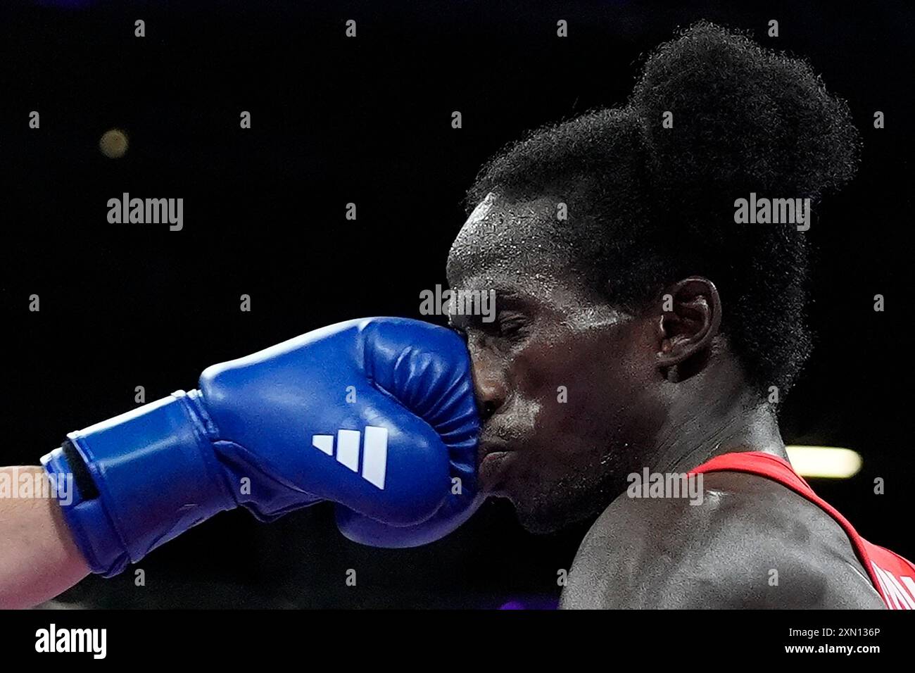 Thailand's Thitisan Panmot, left, fights Cabo Verde's David De Pina in ...