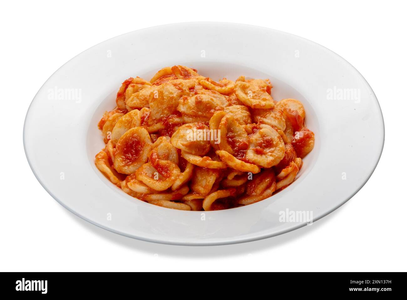 Orecchiette pasta with tomato sauce in white dish isolated on white ...