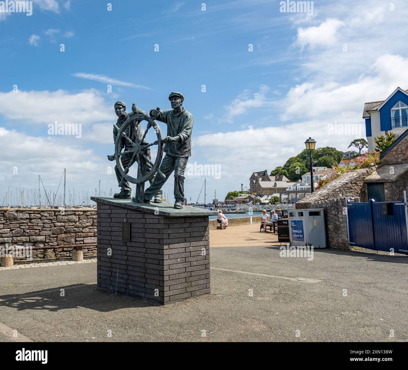 The Man and boy statue in Brixham harbour on the Devon coast Stock ...