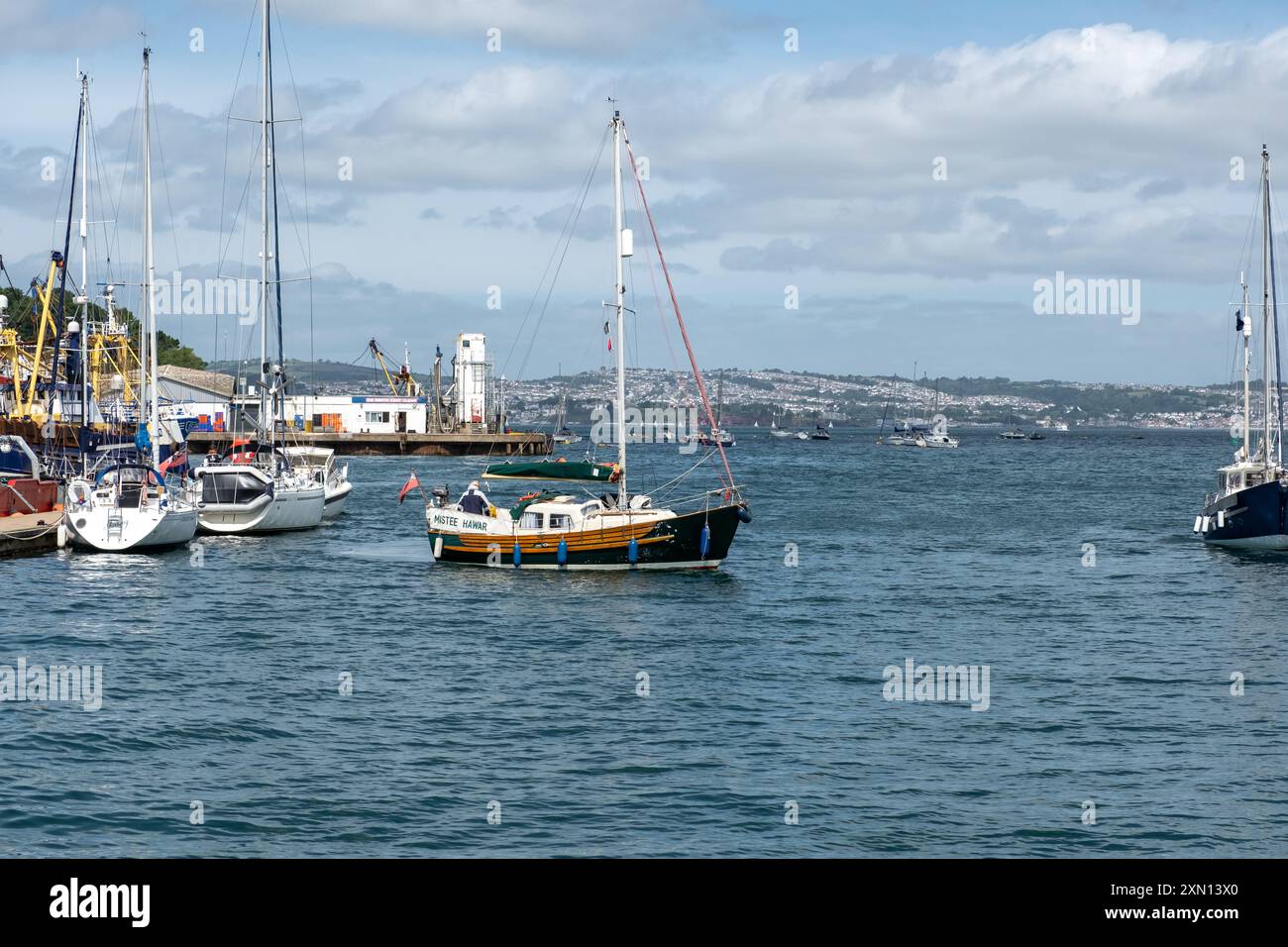 Boats in Brixham harbour in the English Riviera and on the Devon coast ...