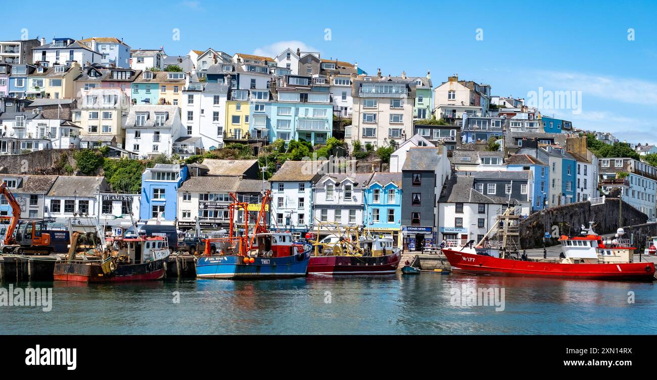 Colourful houses overlooking the harbour in the seaside town of Brixham ...