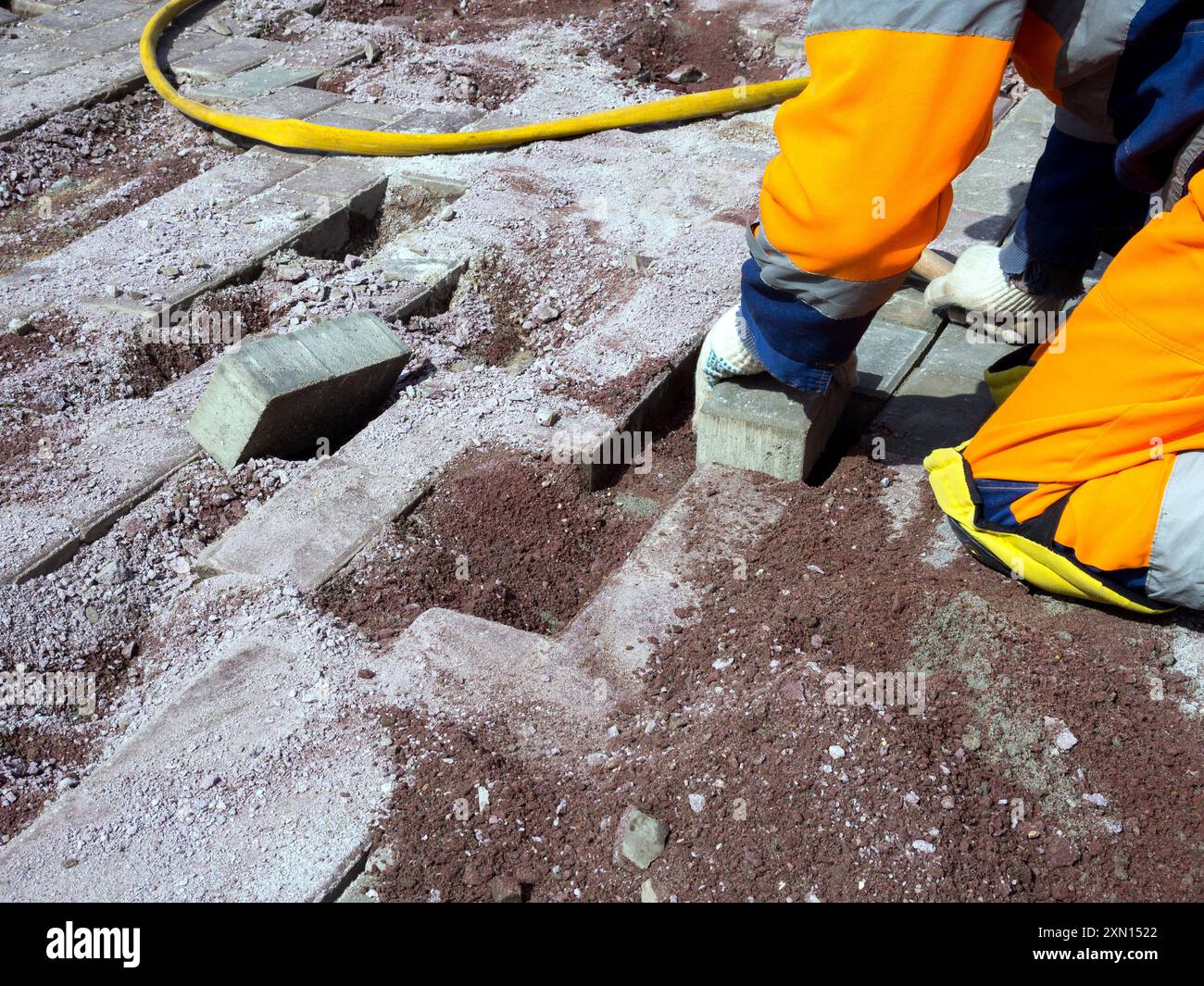 Partial replacement of paving slabs Stock Photo - Alamy