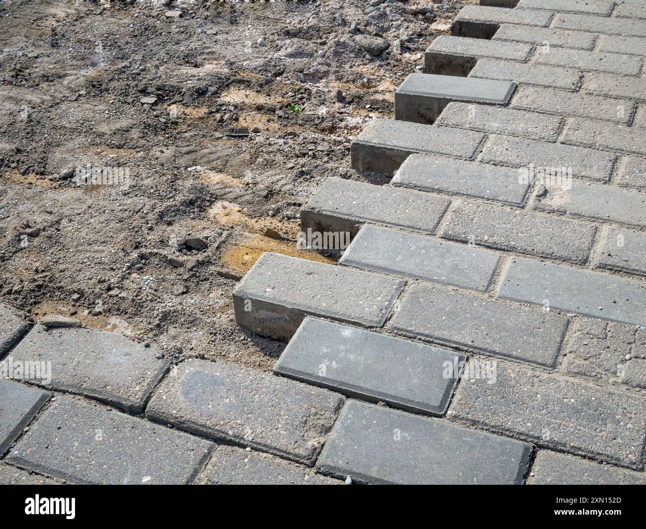 Paving stones in the process of laying Stock Photo - Alamy